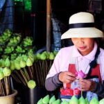 Sunrise blessing walk towards famous temple with fruit and flower donation - Practical Details and Value