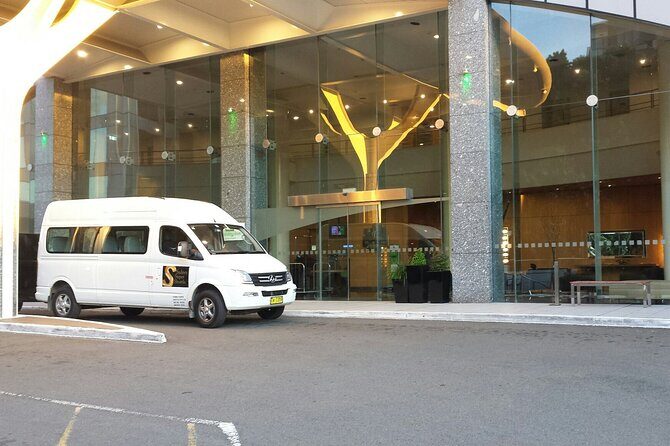 Sydney Airport to Sydney CBD shared ride seat in vehicle shuttle transfer - Pros & Cons Highlighted by Travelers