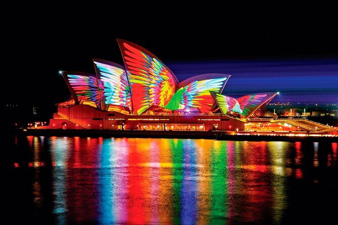 Vivid 90-Minute Sydney Harbour Intimate Catamaran Cruise with Canapes - The onboard experience: amenities and atmosphere