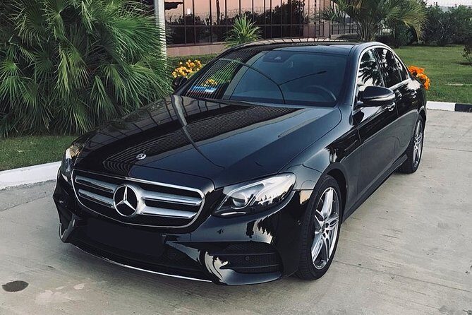 Arrival Private Transfers: Don Mueang Airport DMK to Bangkok in Business Car - Meeting Point and Logistics