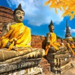 Ayutthaya Historic Park Group Tour from Bangkok - Wat Mahathat: The Iconic Buddha Head in Tree Roots