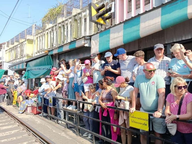 Bangkok: Iconic Floating Markets and Train Market Tour - Floating Along Damnoen Saduak’s Canals