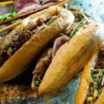 Best Seller Hanoi Street Food Tour with Train Street Visit - The Sum Up