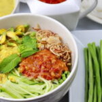 Breakfast Walking City Tour - Crossing the Royal Gardens and the Landmark Grand Hotel d’Angkor