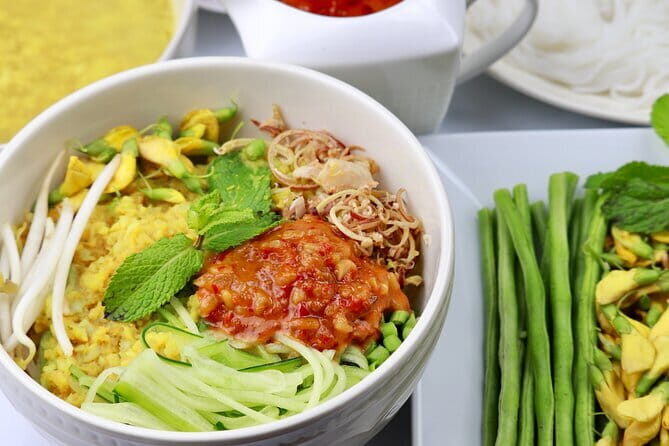 Breakfast Walking City Tour - Crossing the Royal Gardens and the Landmark Grand Hotel d’Angkor