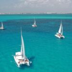 Catamaran to Mujeres Island with Open Bar on Board from Cancun - Authentic Experiences and the Real Deal