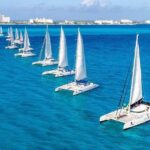 Catamaran tour to Isla Mujeres with snorkeling, open bar - Isla Mujeres: Relaxation and Exploration