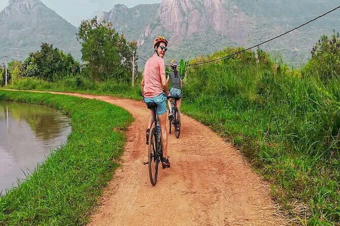 Dambulla and Sigiriya Cycling Tour from Kandy - Water Reservoir Swimming and Relaxation