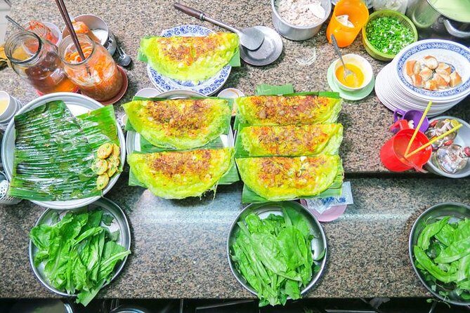 Food tour by Vespa - SAIGON AFTER DARK - Authentic Experiences and Genuine Insights