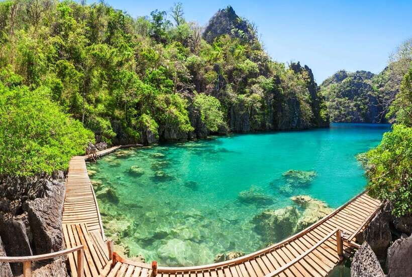 From Coron: Island Hopping Boat Day Trip with Buffet Lunch - Exploring Malcapuya Island and Kayangan Lake