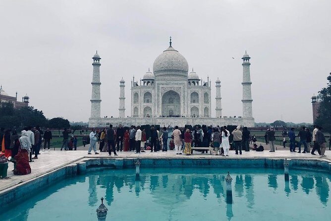 From Delhi: Taj Mahal, Agra Fort, and Baby Taj Day Trip - Visiting the Taj Mahal: The Epitome of Love