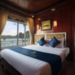 From Hanoi: 2D1N Ha Long Bay Deluxe Cruise with Bus Limousine - Evening Highlights: A Romantic Dinner & Night on Board