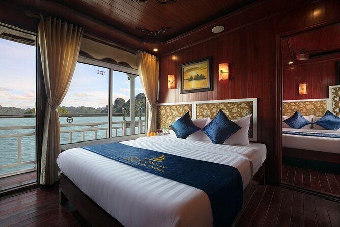 From Hanoi: 2D1N Ha Long Bay Deluxe Cruise with Bus Limousine - Evening Highlights: A Romantic Dinner & Night on Board