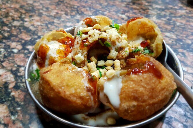 Half-Day Street Food Walking Tour in Varanasi - Transportation and Group Experience