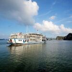 La Pinta Cruise Explore Halong and Lan Ha Bay from Hanoi 3 days. - Day Two: Dawn, Discovery, and Beach Bliss