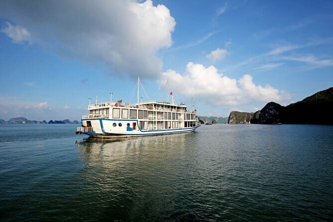 La Pinta Cruise Explore Halong and Lan Ha Bay from Hanoi 3 days. - Day Two: Dawn, Discovery, and Beach Bliss