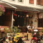 Morning food tour with market Temples option Kuangsi waterfall - Detailed Breakdown of the Experience