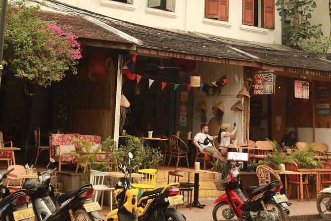 Morning food tour with market Temples option Kuangsi waterfall - Detailed Breakdown of the Experience