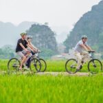 Ninh Binh Full day tour: Explore Hoa Lu-Am Tien Cave-Tam Coc - From Ancient Temples to BreathtakingNature
