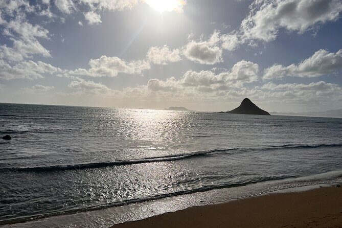 Paddle boarding and hiking adventure at Mokoli'i Island. - Approaching Mokolii Island