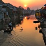 Private Fengjing and Xitang Water Town Sunset Boating Tour with Dinner from Shanghai - What the Tour Includes and What to Consider