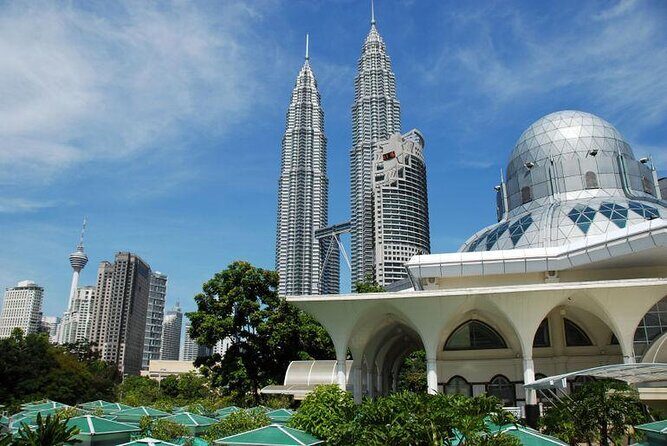 Private Full-Day Tour includes Petronas Twin Towers & Batu Caves - Who Would Benefit Most?
