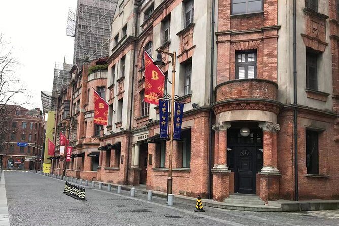 Private Tour of Fengjing Ancient Town and Shanghai Sightseeing with Pickup - A Stroll Down Nanjing Road: The Heart of Shanghai’s Commerce