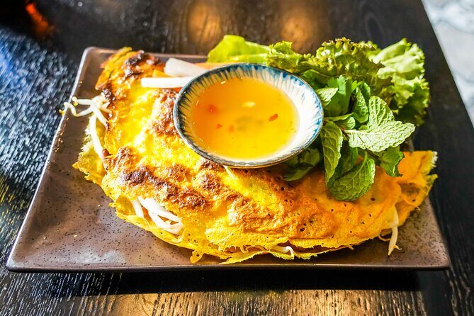 Saigon By Night and Vietnam Local Food on Motorbike - Detailed Breakdown of the Itinerary