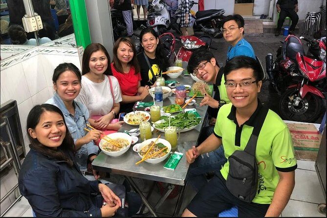 Saigon Night Sights & Local Food by Motorbike| Opt: Ao Dai Riders - First Stop: Saigons Local Flavors & Historical Scene