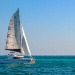 Sail to Paradise Catamaran Tour with Snorkel and Beach Club - The Itinerary: From Sailing to Relaxing