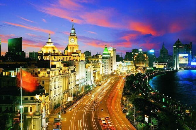 Shanghai by Night with Fine Local Dinner and VIP River Cruise Experiences - Hotel Pickup & Introduction