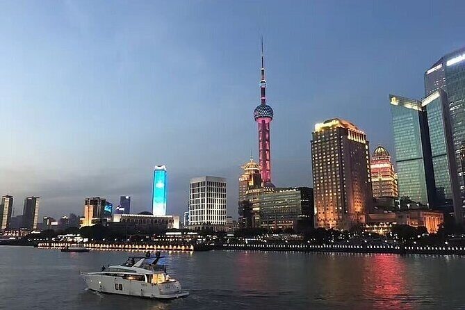 Shanghai Private Night Tour with Huangpu River Cruise, the Bund and Xintiandi - Nanjing Road: Shopping and City Vibe