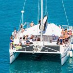 Snorkel adventure to Isla Mujeres by Catamaran. Open Bar and buffet included. - Transportation and Group Dynamics