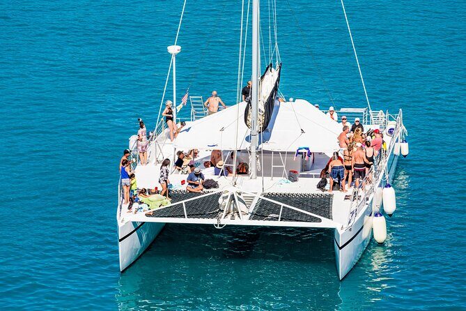 Snorkel adventure to Isla Mujeres by Catamaran. Open Bar and buffet included. - Transportation and Group Dynamics