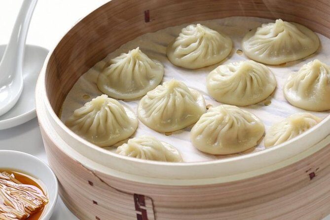 Taipei 101 Top Floor Tour and Dinner at Din Tai Fung - Exploring Four Four South Village