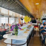 Unique Halong 5 Star Day Cruise: Buffet Lunch, Kayaking & Titops - Titop Island: Climb, Sunbathe, and Take in Panoramas