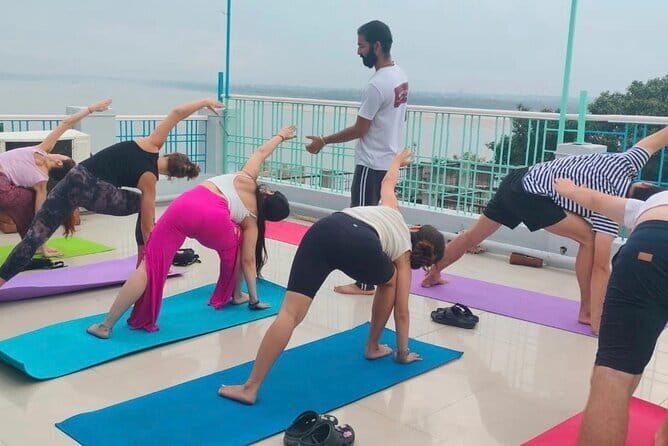Yoga In Varanasi: Sunrise Yoga with Ayush - Exploring the Scenic Setting: The Rooftop Overlooking the Ganges