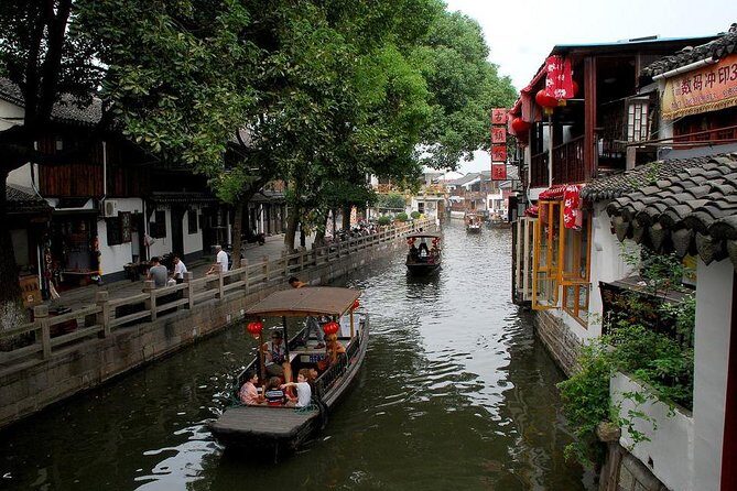 Zhujiajiao Ancient Town & Night Luxury Cruise in Shanghai - Exploring Local Silk at Jiangnan Silk Shopping Center