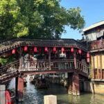 Zhujiajiao Water Town & Shanghai Highlights Day Tour - Customizable Itinerary and City Landmarks