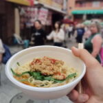Kobe: 1.5-Hour Local Street Food Guided Tour at Nankinmachi - The Atmosphere and Group Dynamics