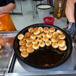 Wuhan: Guided Street Food Tour on Sanhaiguan Road - The Vibrant Atmosphere and Authentic Flavors