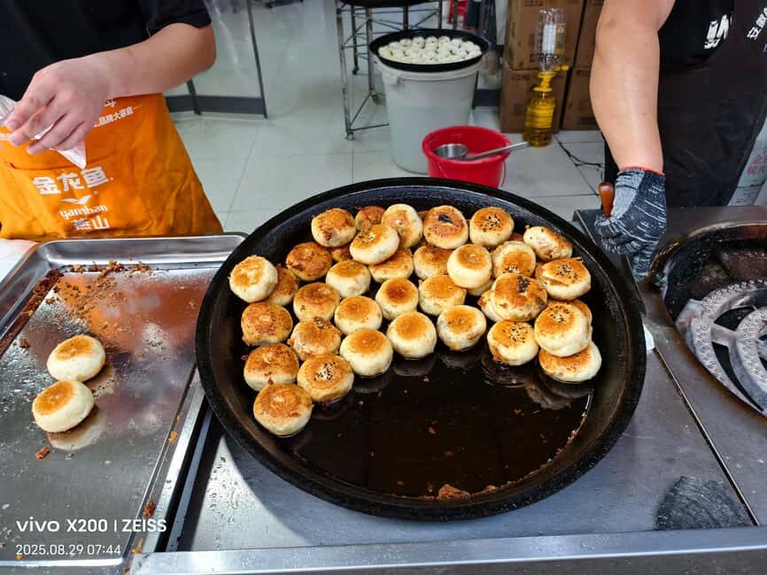 Wuhan: Guided Street Food Tour on Sanhaiguan Road - The Vibrant Atmosphere and Authentic Flavors