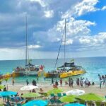 7 Mile Beach Party Catamaran Cruise with Snorkeling & Ricks Cafe - Value and Practicalities