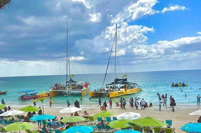 7 Mile Beach Party Catamaran Cruise with Snorkeling & Ricks Cafe - Value and Practicalities
