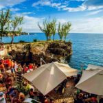 7Mile Beach/Ricks Cafe Tour with Free Shopping from Montego Bay - Ricks Café: The Cliffside Classic