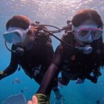 Boat entry diving at the Blue Cave in Onna Village, Okinawa! - FAQs