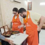 Delhi: Indian Cooking Class with Meal and Market Visit - Learning About Indian Spices and Cooking Techniques