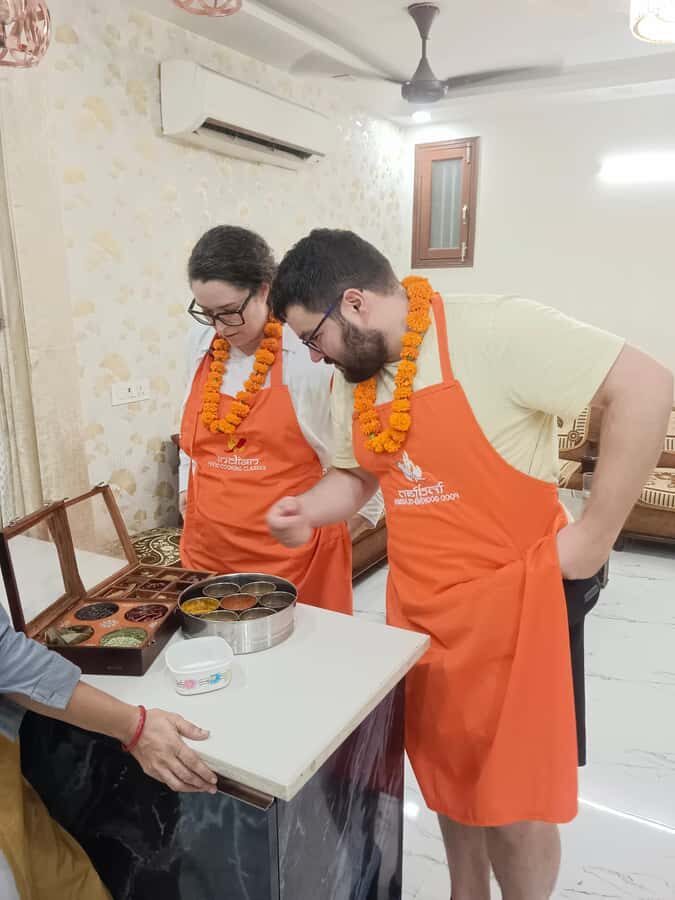 Delhi: Indian Cooking Class with Meal and Market Visit - Learning About Indian Spices and Cooking Techniques