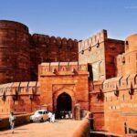 From Delhi: Sunrise Taj Mahal Tour With Elephant Conservation - Exploring Agra Fort: Mughal Majesty