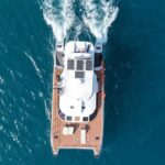 Half Day Coral Island Premium Yacht Tour with Sunset Dinner - The Experience – Pros and Cons